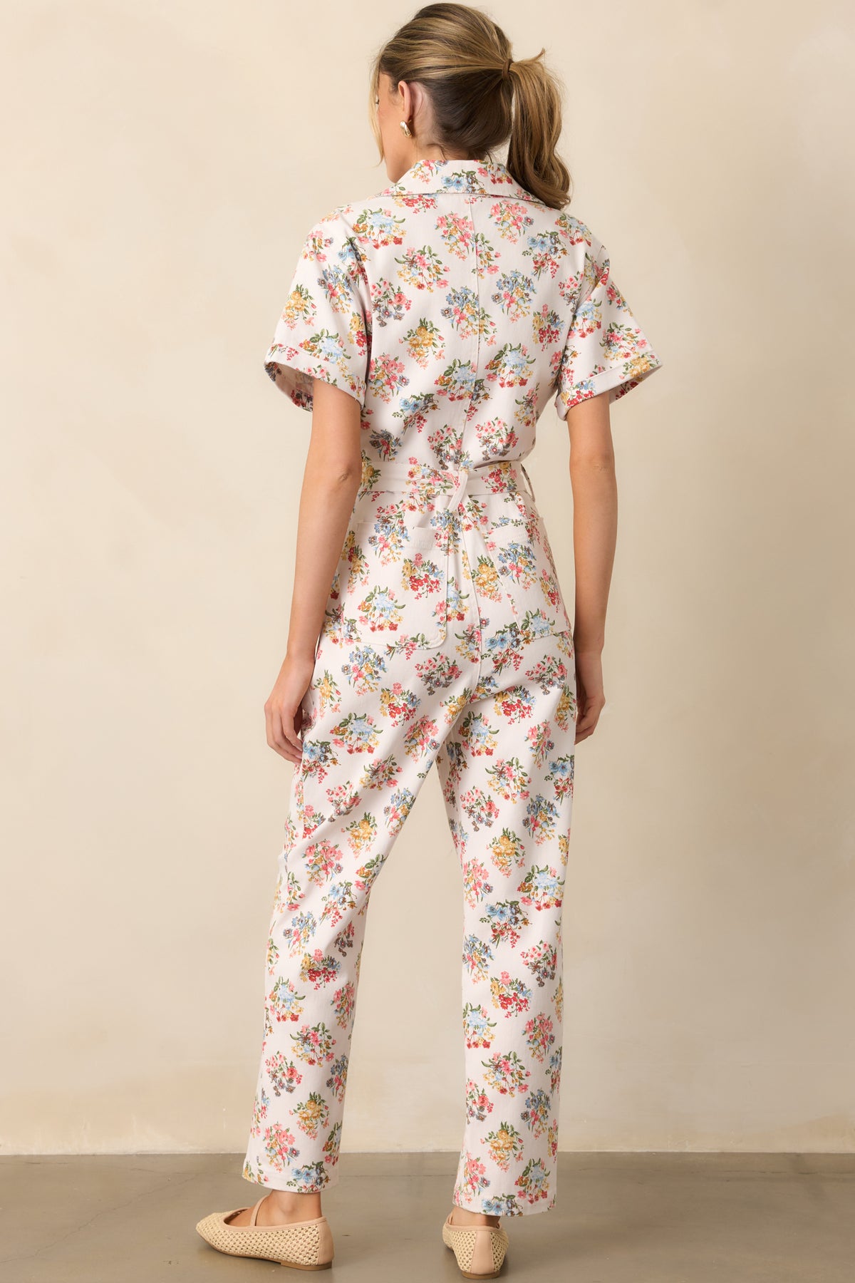 Ivory Floral Button Front Jumpsuit - All Playsuits | Red Dress