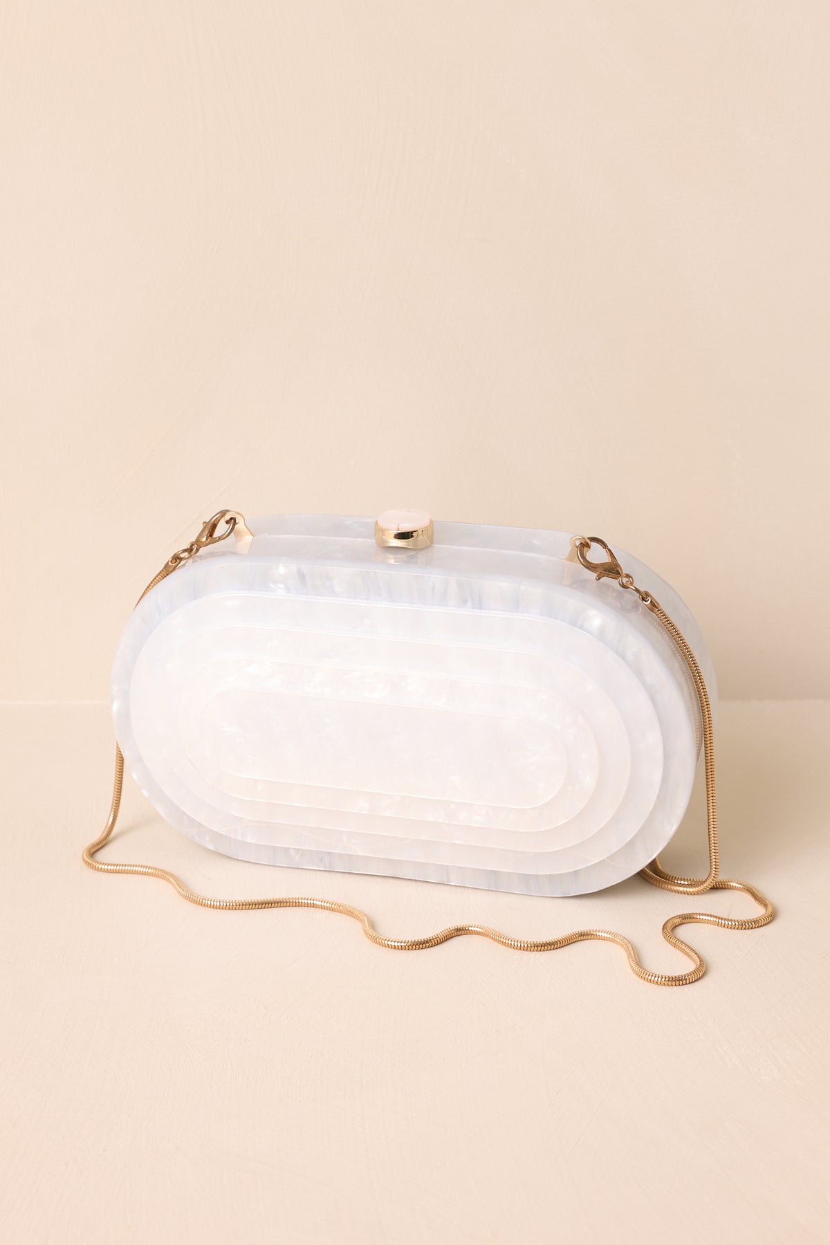 Ivory Pearlescent Textured Clutch - All Accessories | Red Dress